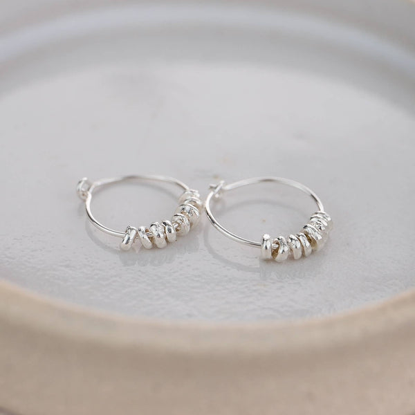 HANDMADE STERLING SILVER HOOPS WITH RECYCLED NUGGET DETAILS - Feather ...